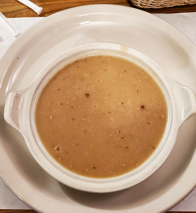 Hearty bean soup that starts the meal with a promise: pace yourself, the best is yet to come.