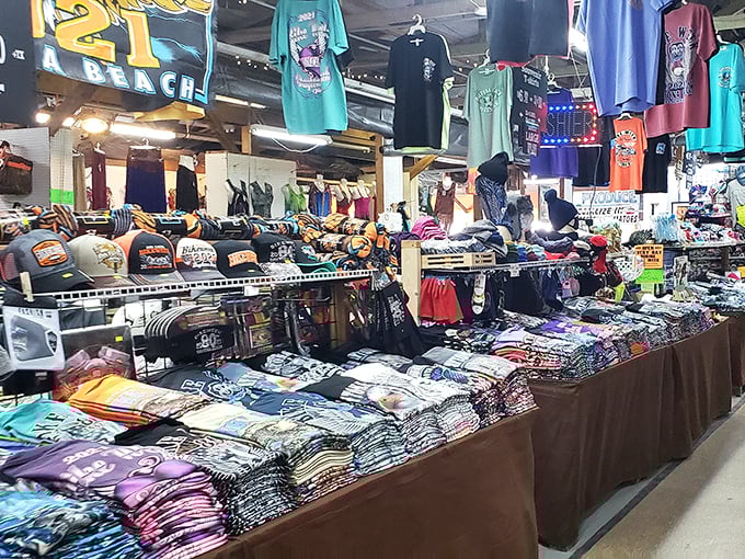 T-shirt diplomacy at its finest, where vacation mementos and local pride meet in a rainbow explosion of wearable Florida souvenirs.