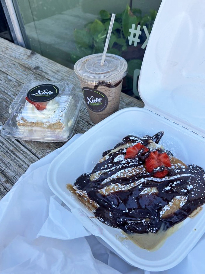 Chocolate-drizzled crepe and slice of cake: the dynamic duo of desserts. One for now, one for later (who are we kidding?).