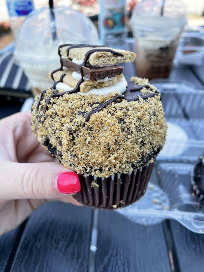 This isn't just a cupcake&mdash;it's architecture. Layers of chocolate, cream, and crumble create a skyscraper of flavor that demands to be demolished one bite at a time.