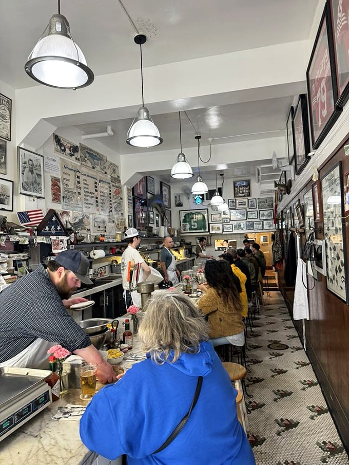 The narrow dining space isn't cramped&mdash;it's intimate, where elbows bump and conversations flow as freely as the wine.