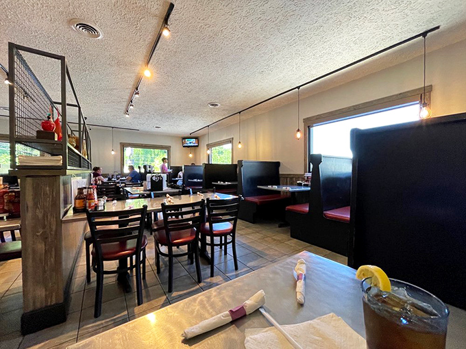 The dining room feels like your favorite uncle's den&mdash;if your uncle happened to be a barbecue savant with excellent taste in track lighting.