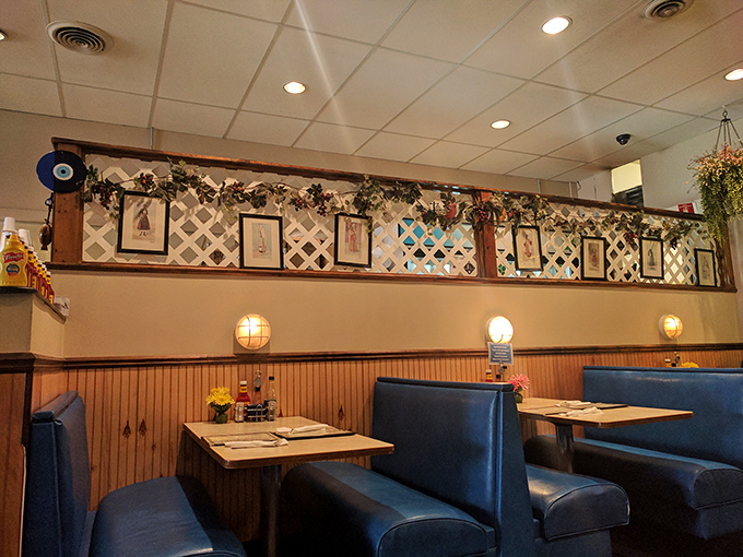 The lattice divider adorned with family photos isn't just decor &ndash; it's a time portal to Mediterranean memories.