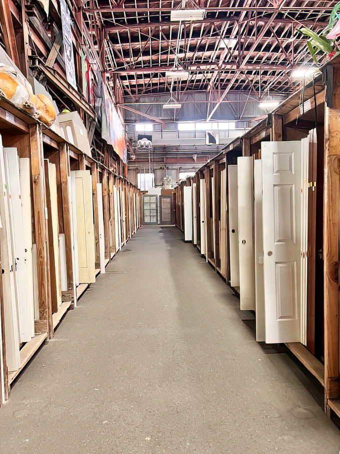 The door aisle: a metaphorical and literal gateway to possibilities. Hundreds of entryways, each with stories of the homes they once graced.