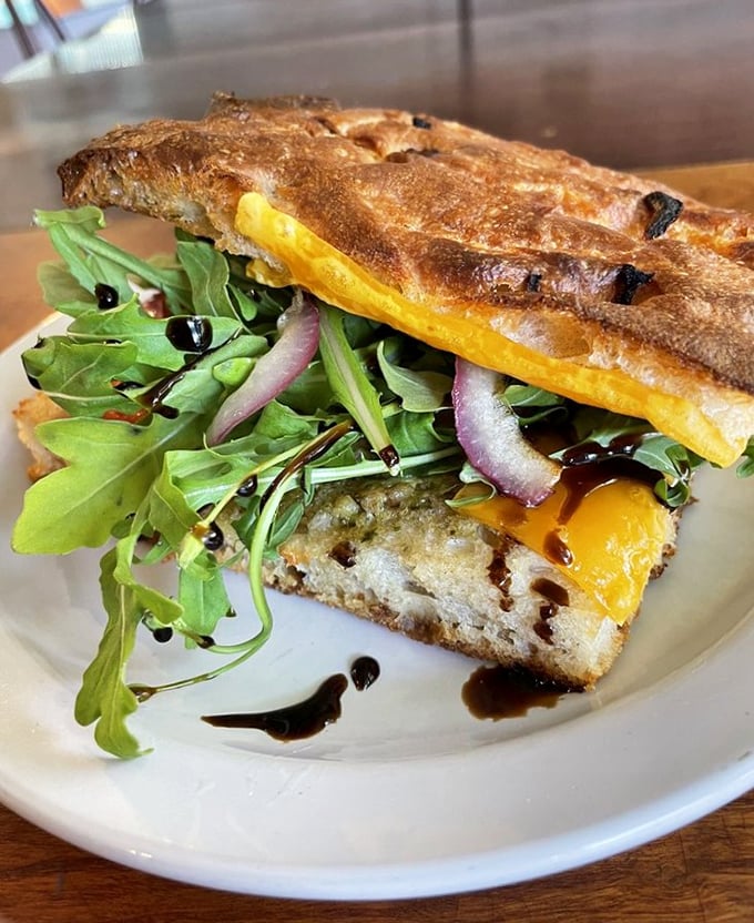 Not just a sandwich but a carefully constructed flavor landscape&mdash;crispy bread, peppery arugula, and that balsamic drizzle playing the perfect supporting role.