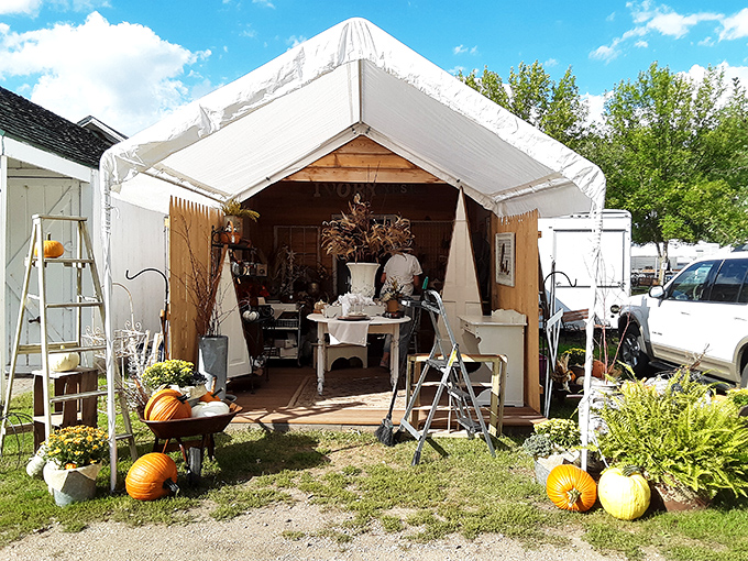 Farmhouse chic before it was trendy. This carefully curated tent offers seasonal d&eacute;cor that would make any HGTV host swoon with autumnal delight.