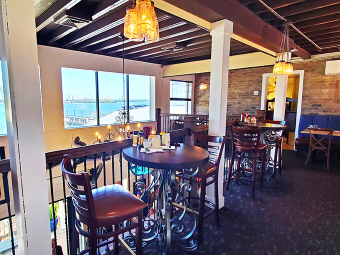 The bustling interior captures that magical moment when strangers become friends over exceptional food.