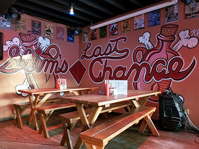 The wall mural says it all&mdash;this is your "Last Chance" for authentic chili before hitting the road. Picnic tables invite lingering conversations.