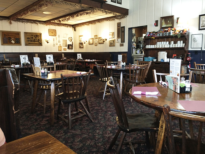 The dining room where memories are made between bites. Wood, warmth, and the wonderful absence of background music featuring pan flutes.