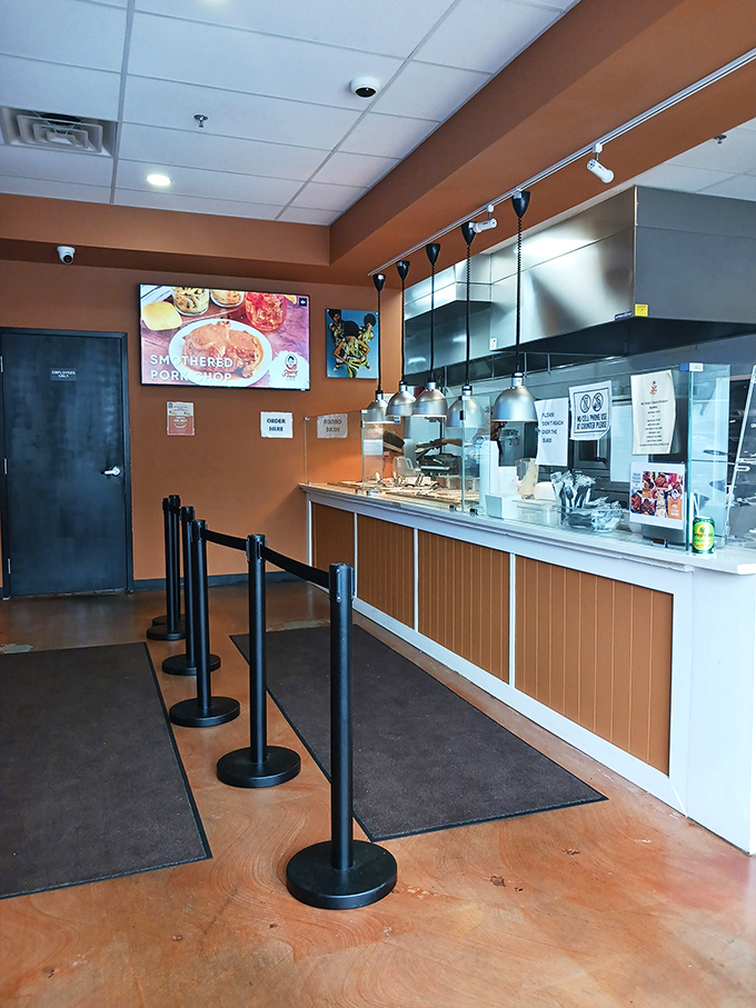 The ordering counter&mdash;where dreams are placed and hunger pangs go to die. Notice the warm orange walls that match the peach theme.