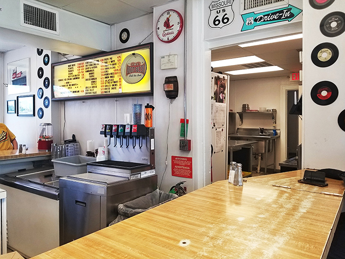 Inside Carl's, the wooden counter and vintage decor aren't retro by design—they're authentic by survival, like vinyl records in a streaming world.