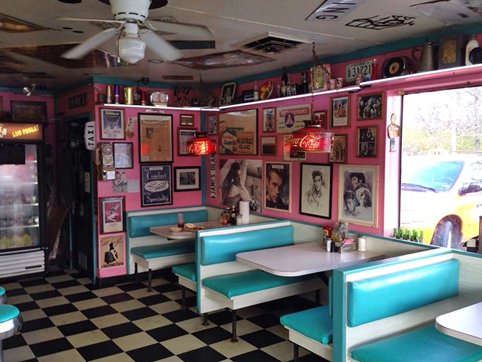 Pink walls adorned with memories, turquoise booths waiting for stories—this isn't just decoration, it's a living museum of American diner culture.