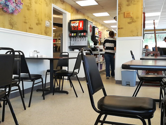 The soda fountain and counter stools offer a nostalgic glimpse into an era when restaurants were community hubs, not Instagram backdrops.