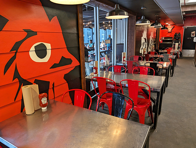 The dining room hums with anticipation and satisfaction&mdash;a temple where the chicken is hot and the conversations are cool.