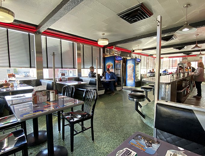Classic diner geometry: straight lines, right angles, and perfectly circular plates that somehow produce the most comforting food imaginable.