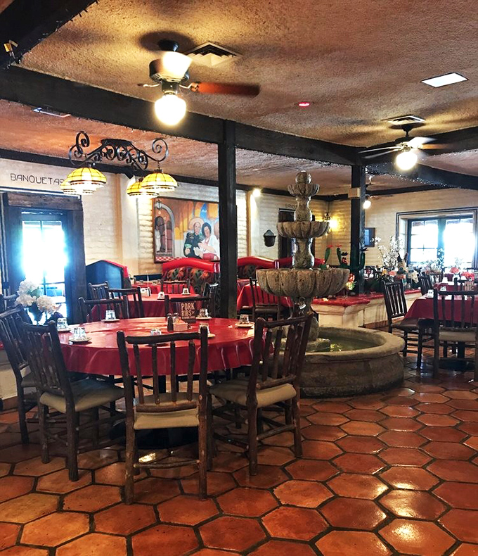 The dining room centers around that beautiful fountain, where the gentle sound of water provides the perfect soundtrack to your meal.