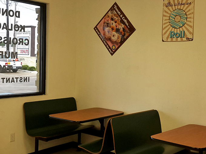 The minimalist dining area says, "Don't get too comfortable &ndash; these donuts are meant to be eaten, not Instagrammed." Old-school charm at its finest.