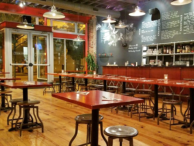 Where industrial design meets Southern hospitality. The chalkboard menu, wooden tables, and exposed ceiling create an atmosphere as authentic as the food.