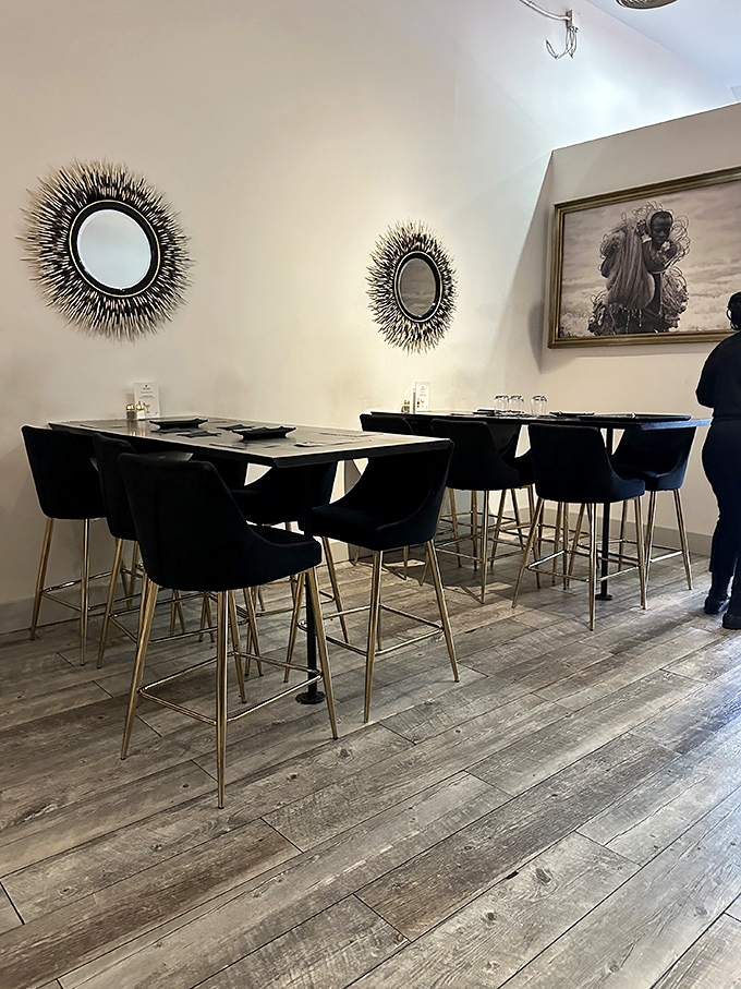 Modern elegance meets maritime memories with these sleek high-top tables and artful black chairs &ndash; comfort with a side of sophistication.