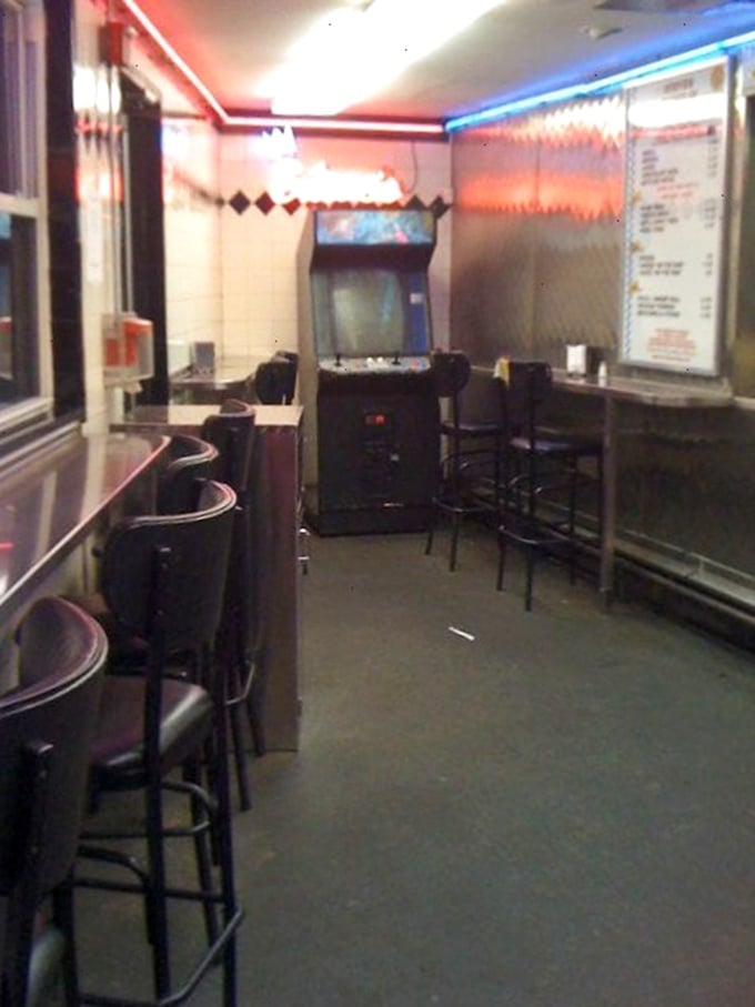 The arcade game in the corner says everything: this place keeps it real. No pretension, just tradition and the promise of satisfaction.