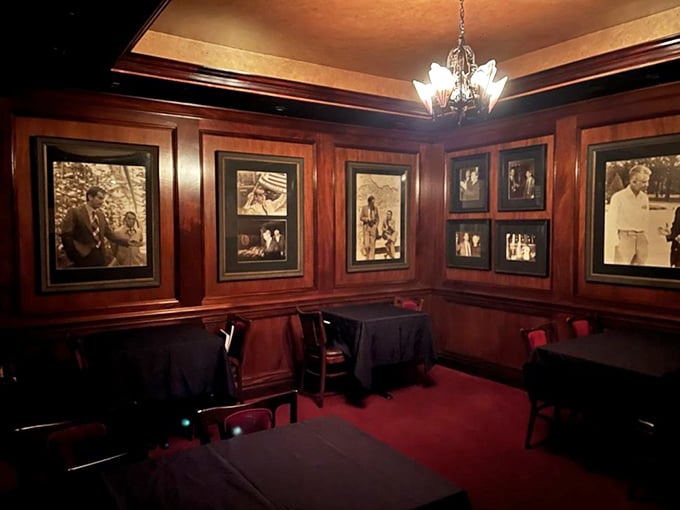 Rich wood paneling and historical photographs create an atmosphere of timeless elegance. Dining here feels like stepping into a more civilized era.