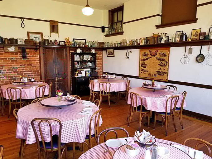 High ceilings, brick accents, and those classic bentwood chairs&mdash;this isn't just a dining room, it's a time machine with table service.