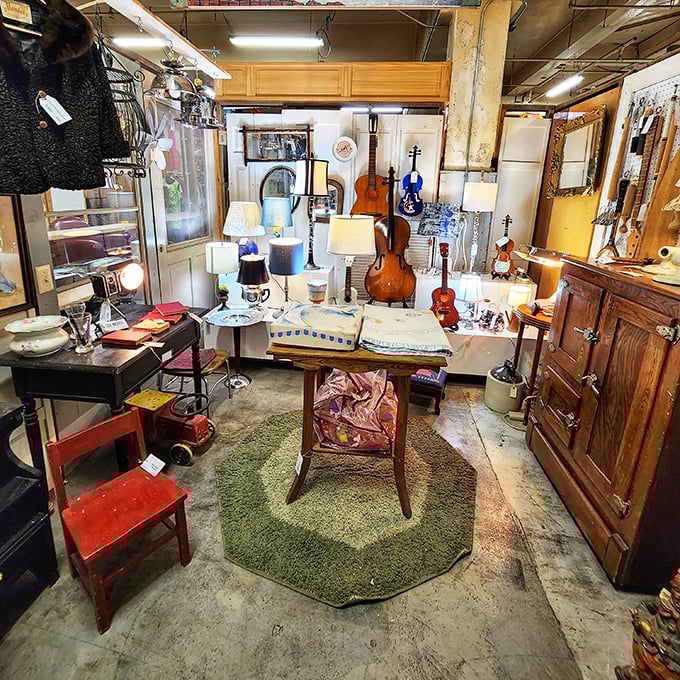 A musical corner where instruments wait patiently for new hands. That cello probably still remembers the last symphony it played decades ago.