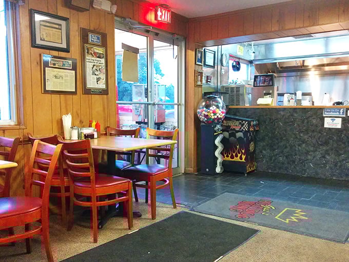 Where wood paneling meets nostalgia, and every table tells a story. The entrance to this culinary time capsule promises comfort beyond the door.