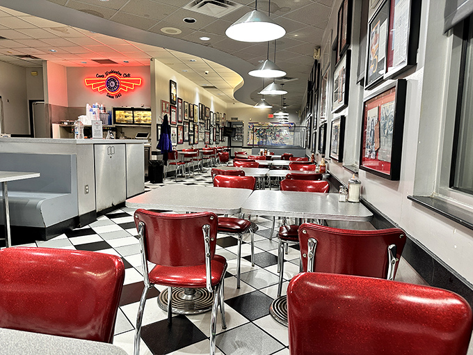 The diner's interior stretches back like a time capsule of American dining, where conversations and chili consumption have happened 24/7 for decades.