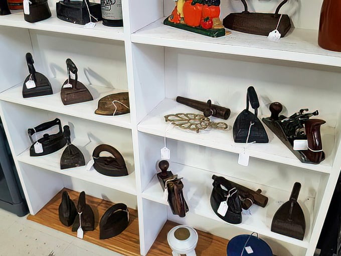 An army of antique irons standing at attention, ready to press your imagination. Before steam and electricity, these were heated on woodstoves by women with forearms of steel.