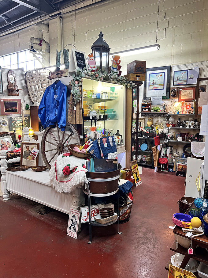 A wagon wheel, vintage signs, and Americana artifacts create a perfect vignette of nostalgia that would make Norman Rockwell reach for his paintbrush.
