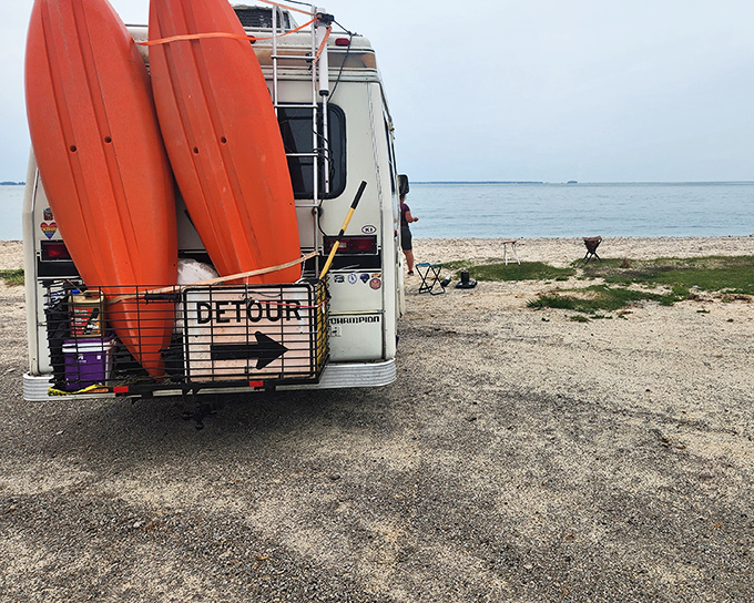 Adventure-mobile, lakeside edition. Nothing says "serious beach day" like bringing your kayaks to explore Lake Erie's hidden coves and shorelines.
