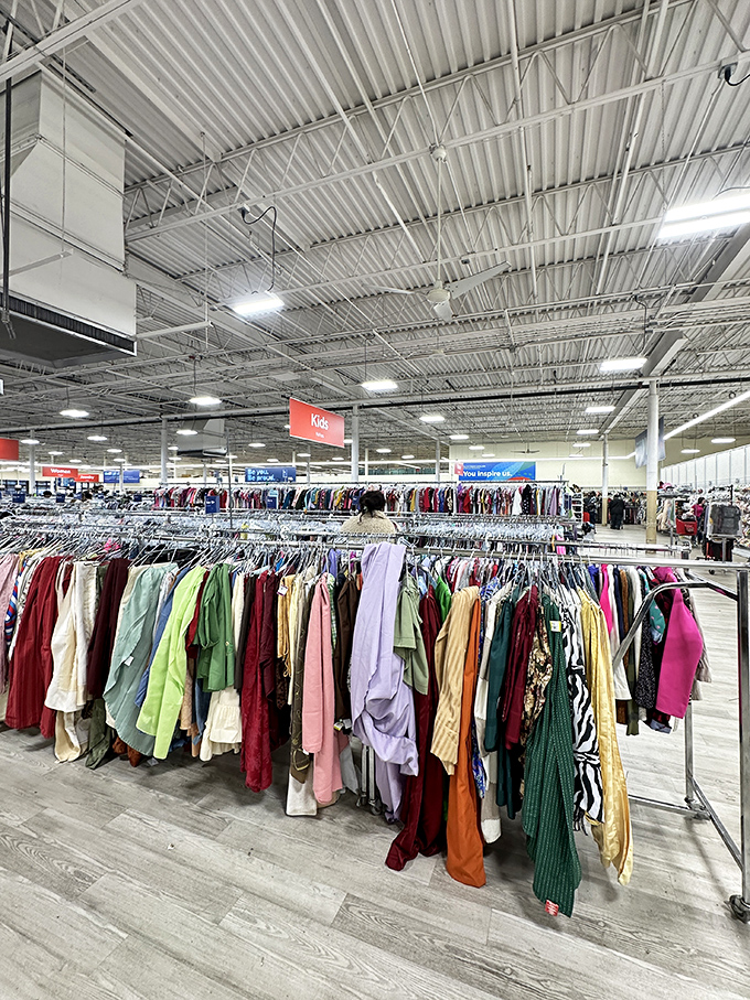 Kid's clothing paradise where growing pains meet budget-friendly solutions, all organized under bright signs and fluorescent optimism.