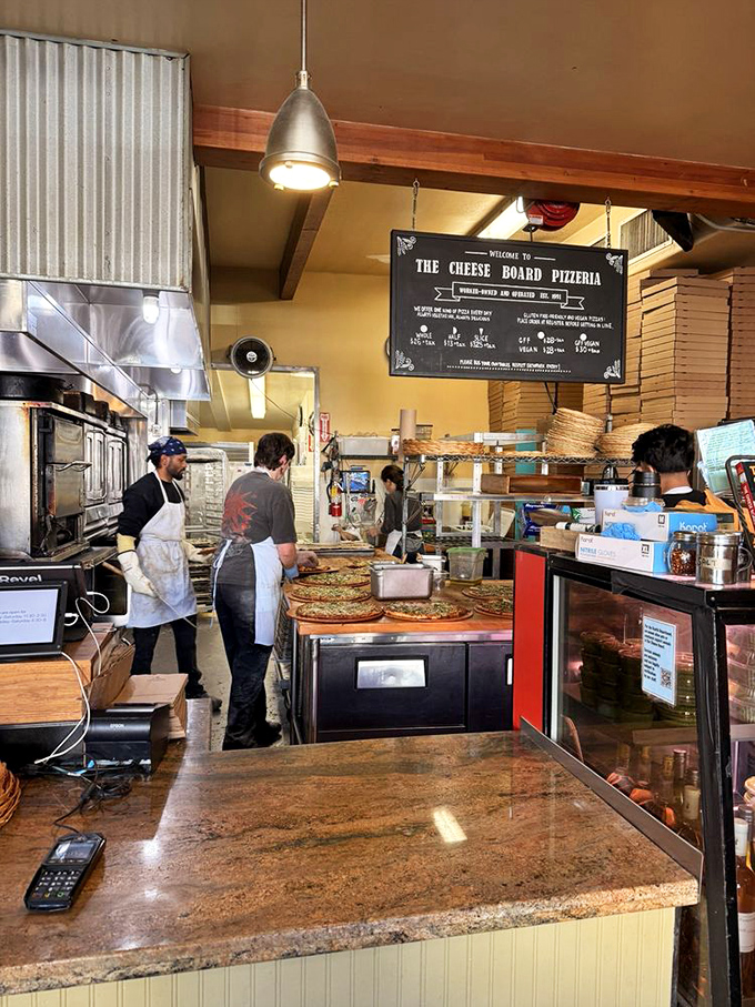 The pizza workshop where magic happens daily. Simple tools, skilled hands, and a commitment to excellence.