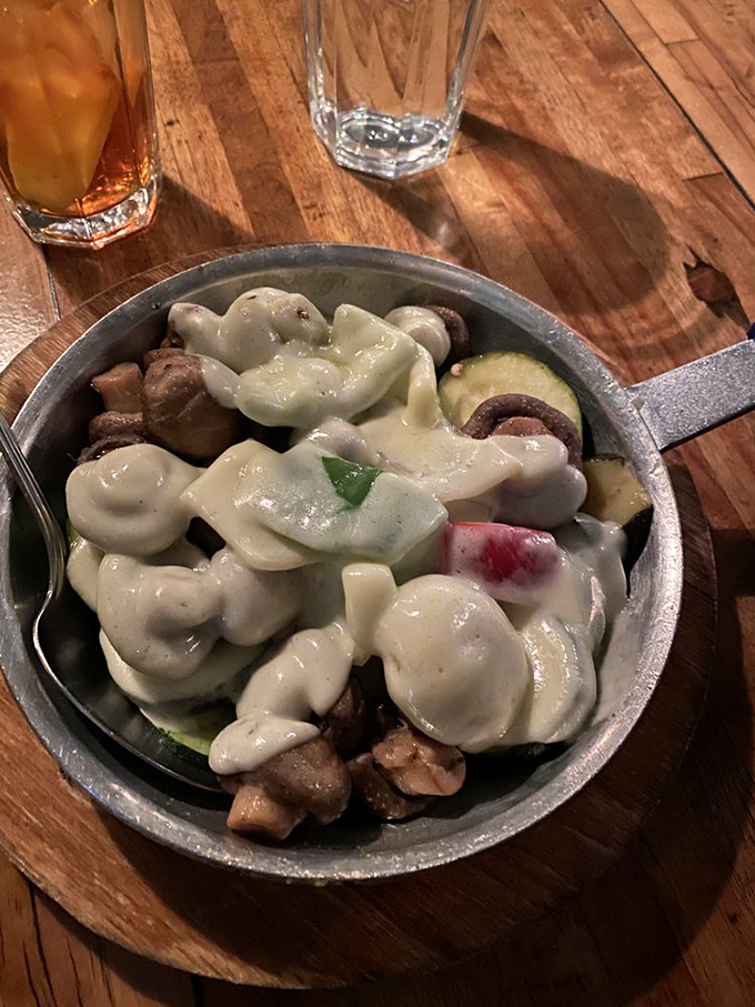 A skillet of creamy goodness that proves Trabuco Oaks isn't just about steaks. This mushroom and vegetable medley is comfort in a cast iron pan.