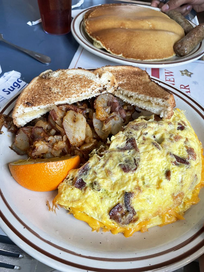 This omelet has more fillings than your average novel, with home fries and toast that aren't mere supporting characters.