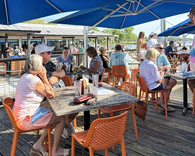 The outdoor deck at Hudson's proves that sometimes the best seasoning is sea breeze and sunshine. Vacation mode: activated.