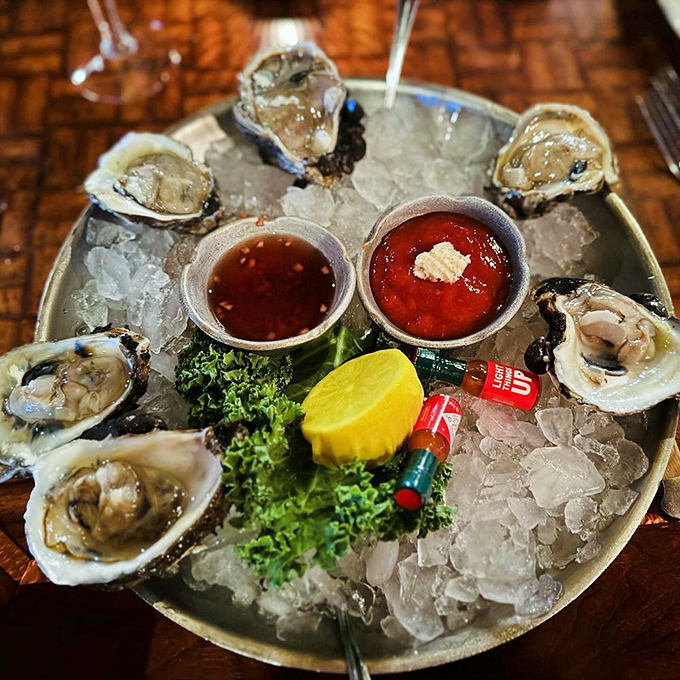 Oysters on ice&mdash;nature's perfect appetizer&mdash;waiting patiently with their cocktail and mignonette companions for their moment of slurpy glory.