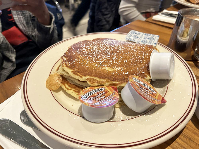 Pancakes the size of hubcaps, dusted with powdered sugar and served with enough butter and syrup to make your cardiologist nervous.