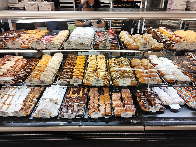 A pastry case that should come with a warning sign: "May cause spontaneous drooling and the immediate abandonment of all diet resolutions."