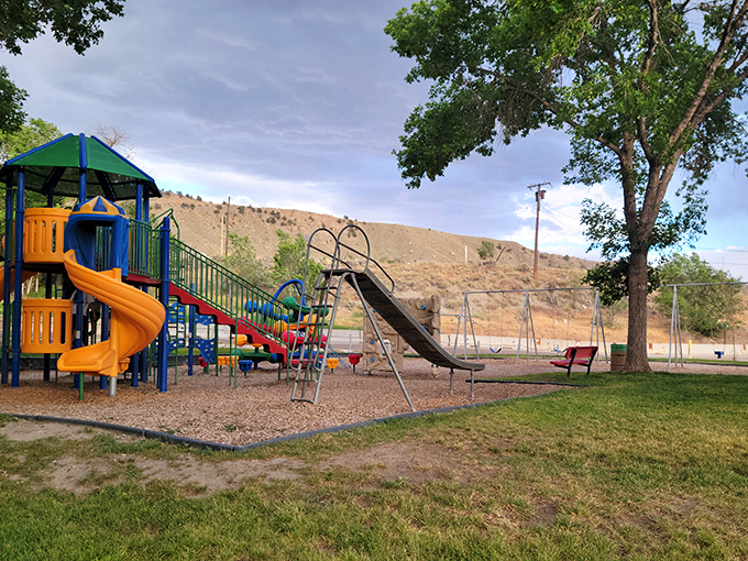 A playground where kids can actually be kids, with the rugged hillsides providing a natural boundary between childhood and the digital world.