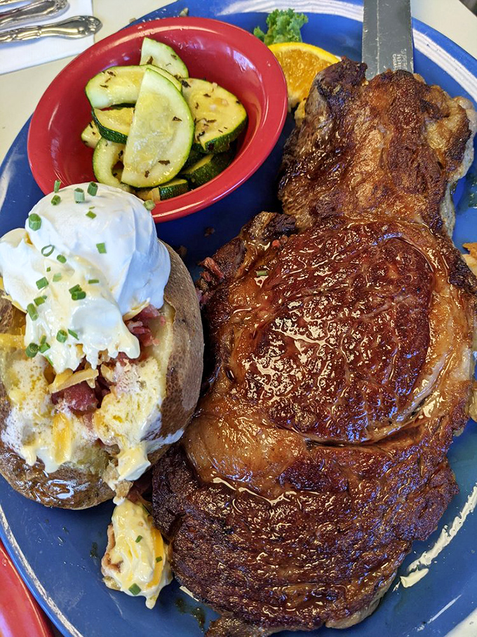 A steak that means business, paired with a loaded baked potato that's dressed for the occasion. Carnivore nirvana achieved.
