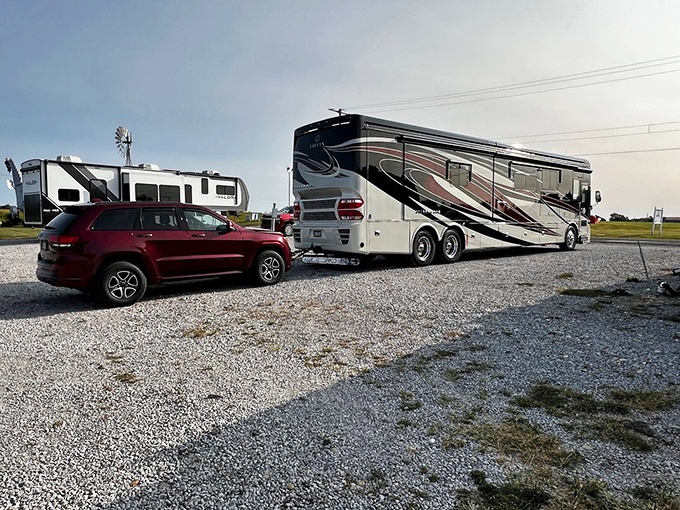 RVs parked nearby suggest the dragon's fame has spread far and wide, drawing road warriors from across America to witness its fiery performance.