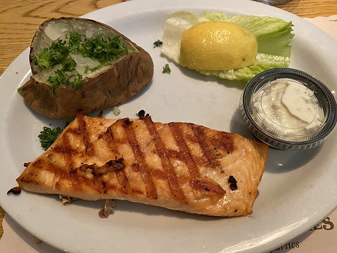 Salmon that's grilled with the confidence of someone who knows exactly what they're doing. That perfect crosshatch pattern isn't just for show.