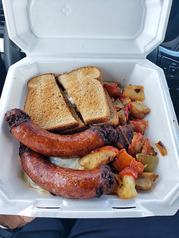 The holy trinity of Delaware breakfast: sausage, home fries, and toast swimming in gravy that could make a vegetarian question their life choices.