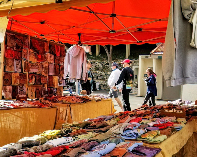 A rainbow explosion of casual wear under the California sun. The clothing section is where vintage t-shirts go for their second act.