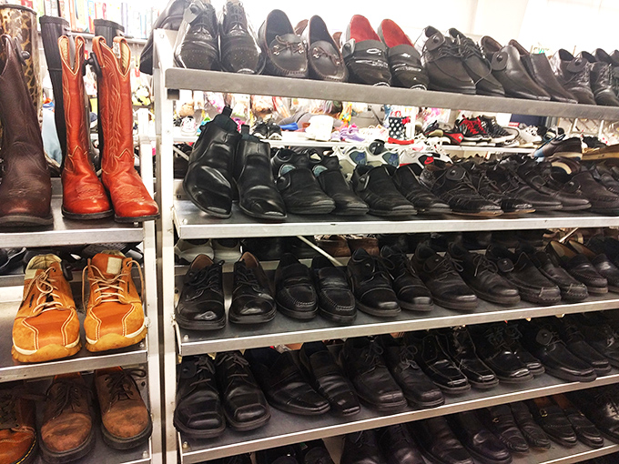 Footwear fantasyland where cowboy boots and dress shoes coexist like old friends sharing stories of their previous adventures.