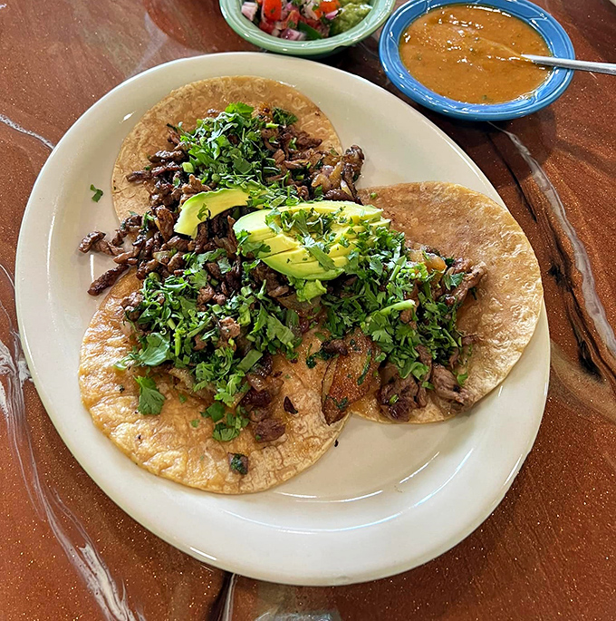 These aren't just tacos&mdash;they're little flavor bombs topped with enough cilantro and avocado to make you temporarily forget your name.