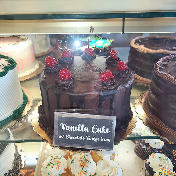 A chocolate cake crowned with cherries that doesn't just whisper "special occasion"&mdash;it announces it with a megaphone. 