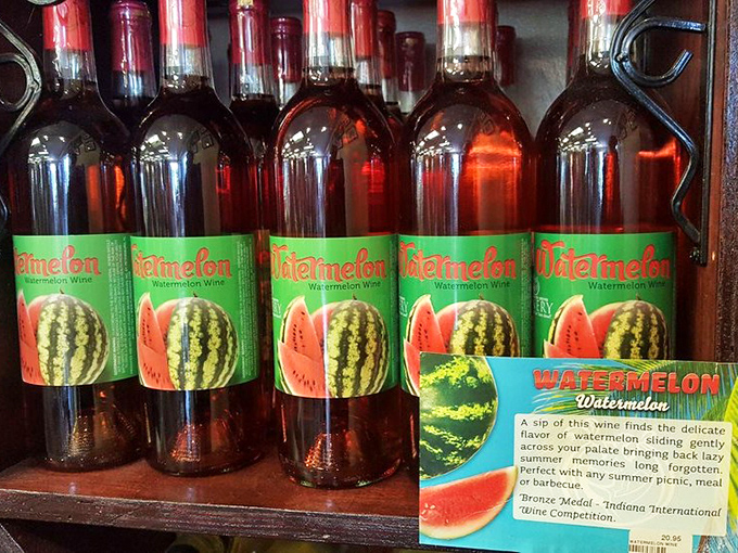 Watermelon Wine bottles stand at attention, their vibrant labels promising summer in liquid form&mdash;picnic optional, good times guaranteed.